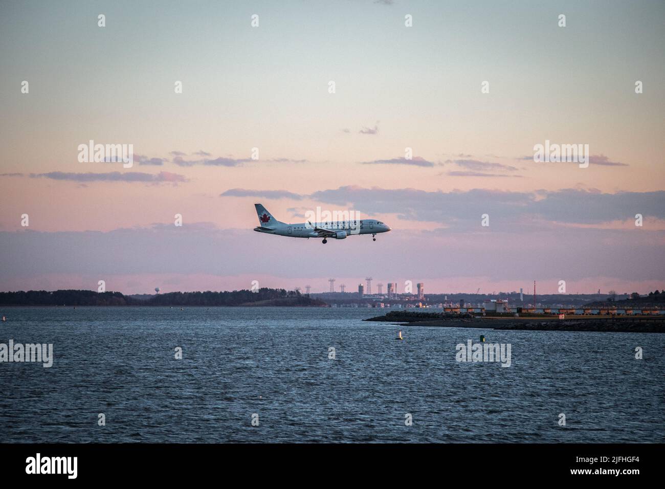 The Air Canada Express plane landing at the airport. Everett ...
