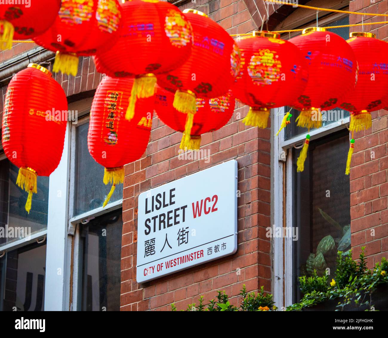 London, UK - March 8th 2022: The street sign for Lisle Street in the ...