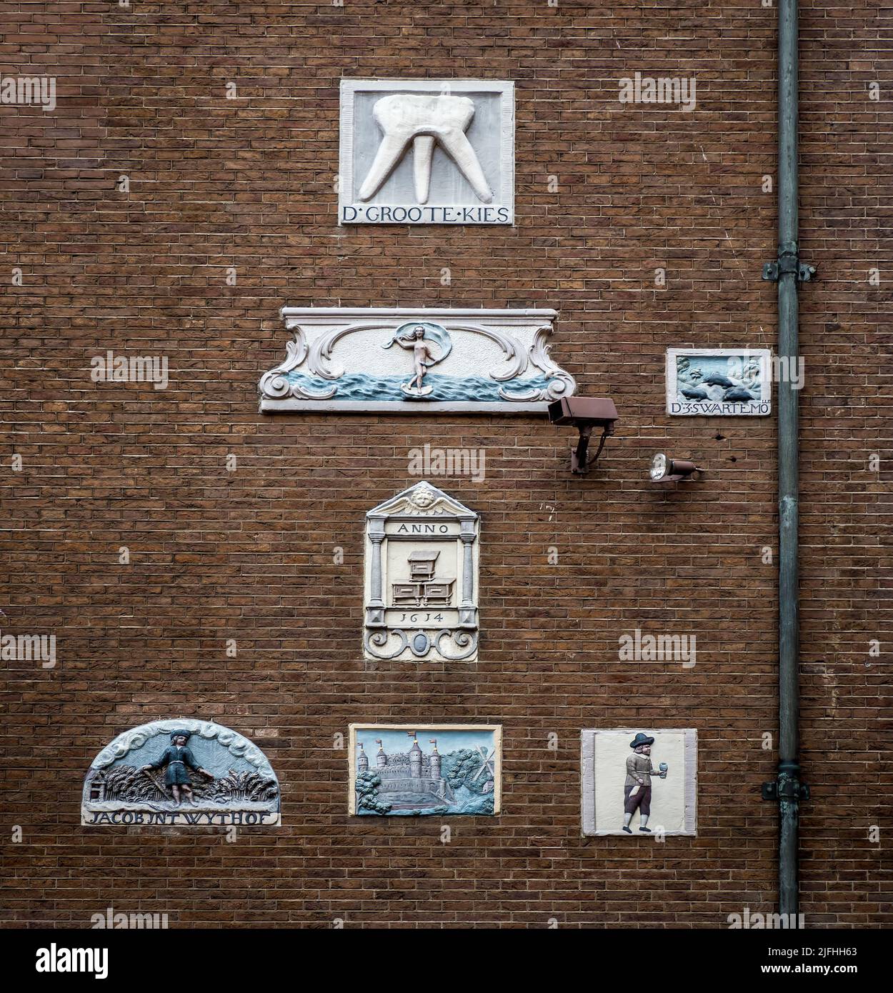 Gable Plaques on the Exterior Walls of the Amsterdam Museum Stock Photo ...