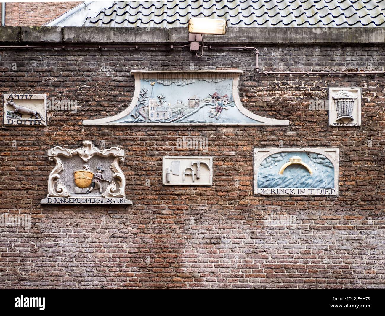 Gable Plaques on the Exterior Walls of the Amsterdam Museum Stock Photo ...
