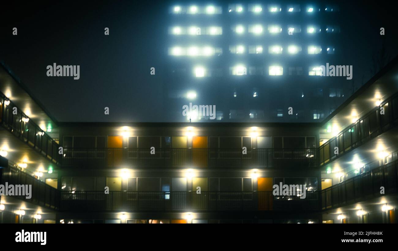A night view of illuminated residential buildings Stock Photo - Alamy