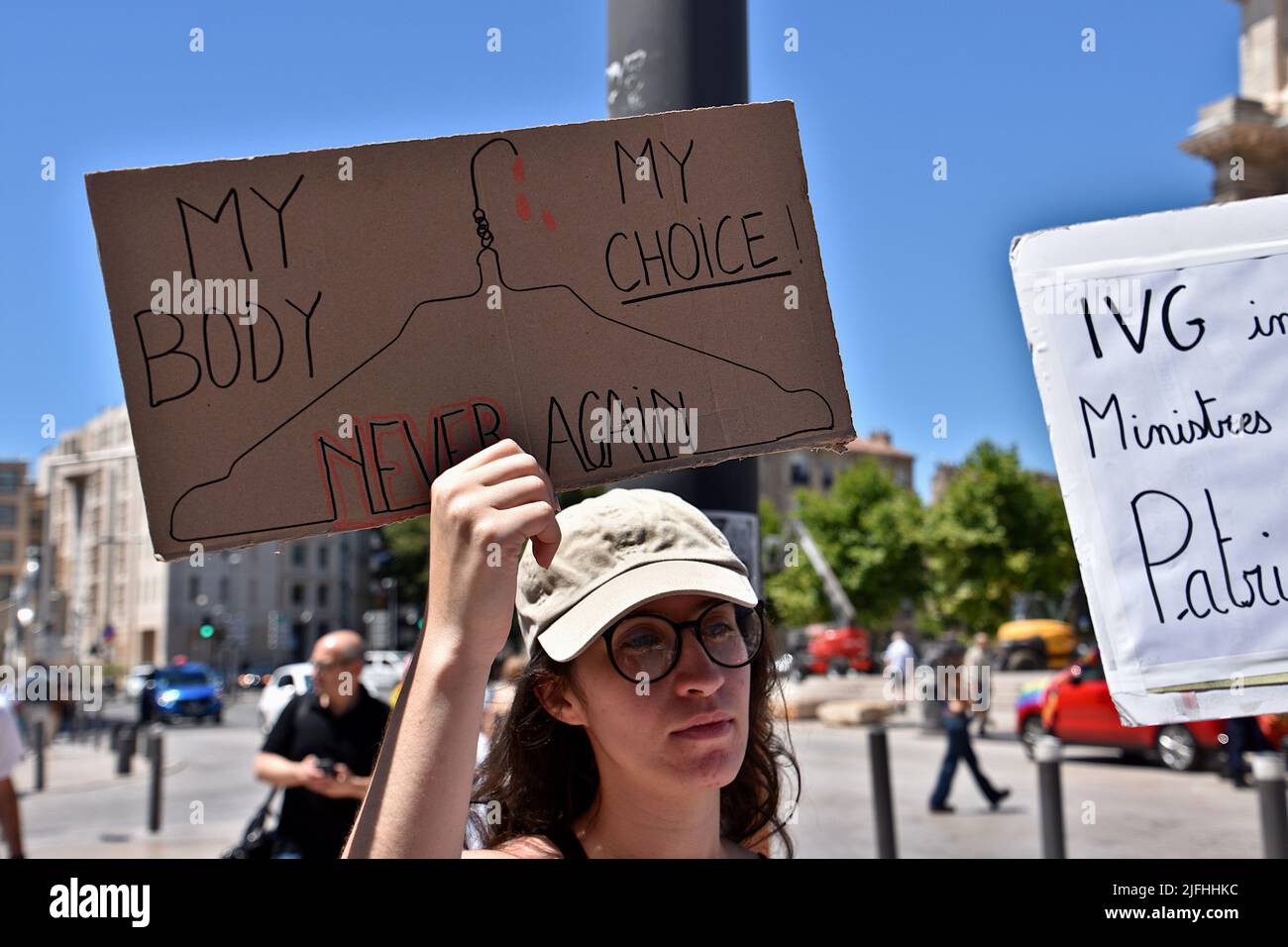 A protester holds a placard expressing her opinion during the ...