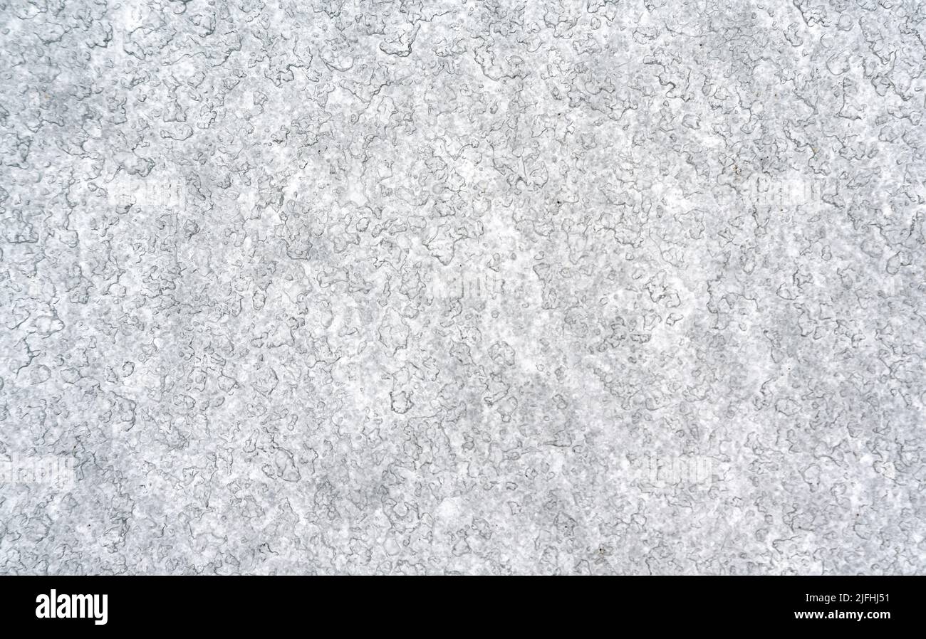 Snow creating texture on the glass. Structure of snow flakes and ice ...