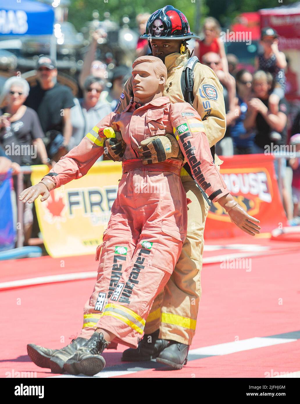 A firefighter compete’s in the Firefit Championships in Montreal ...
