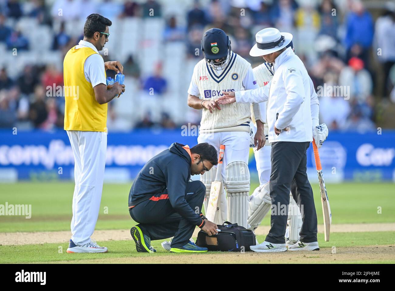 Cheteshwar Pujara of India receives treatment for and injury Stock ...