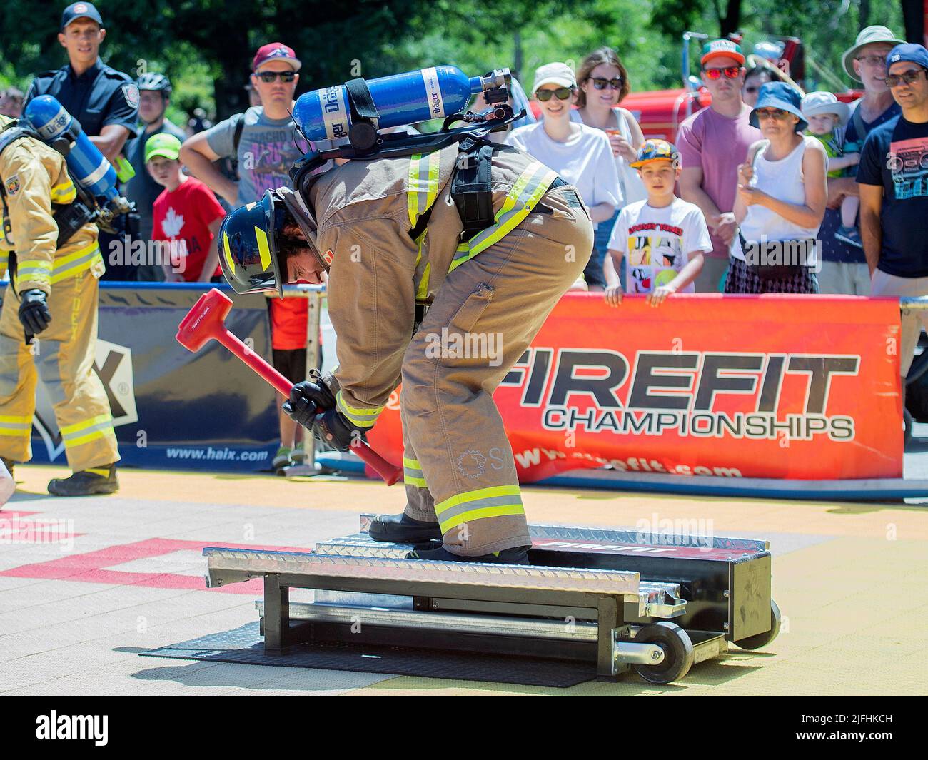A firefighter compete’s in the Firefit Championships in Montreal ...