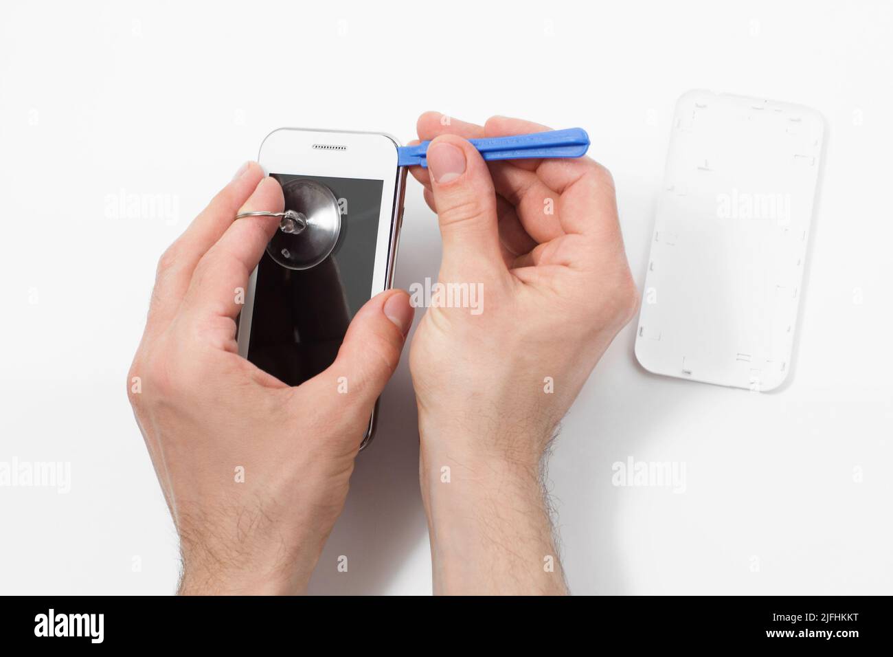 Smartphone disassembling with special tools Stock Photo - Alamy