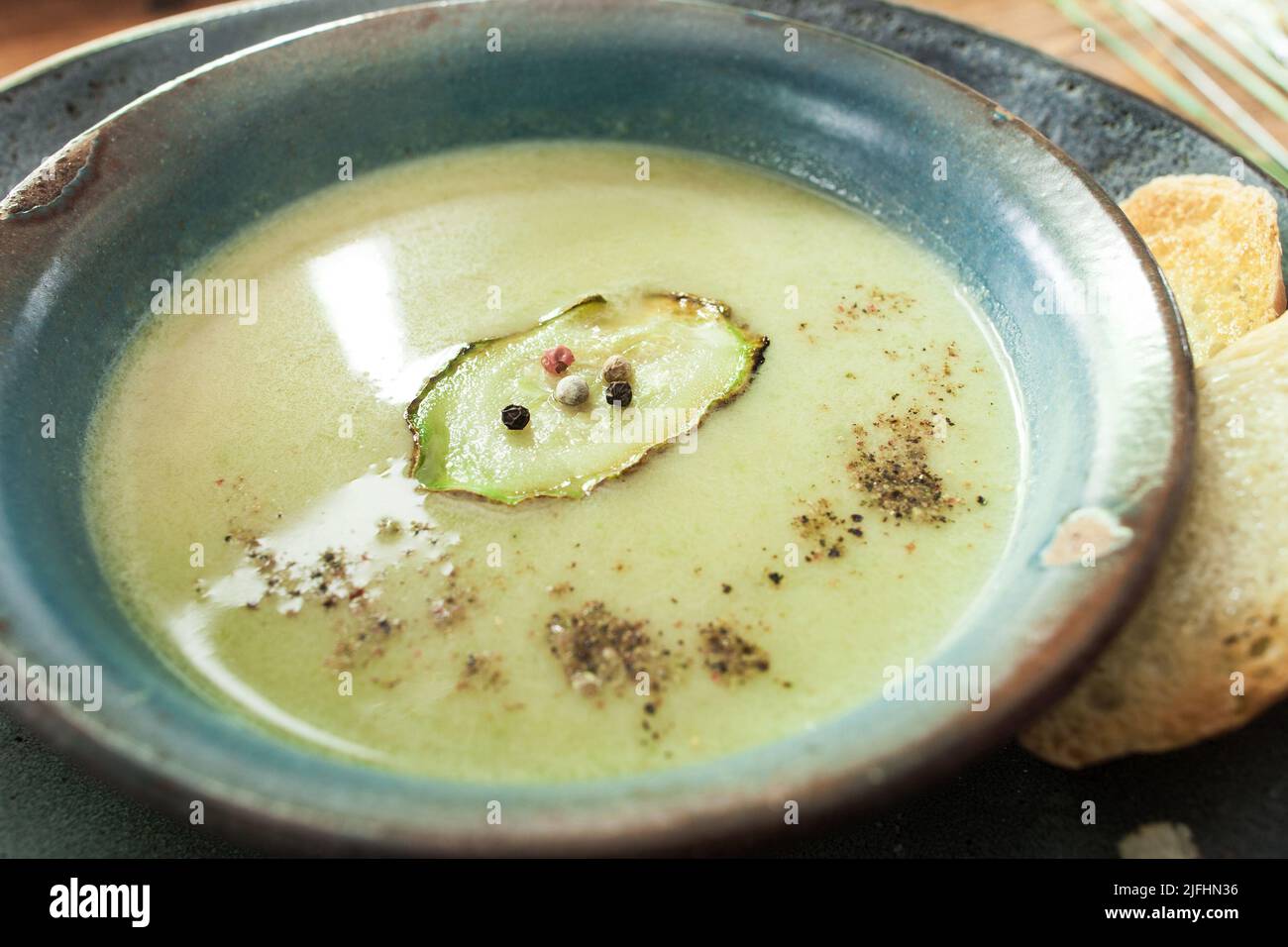 Green soup-puree with vegetable marrow Stock Photo - Alamy