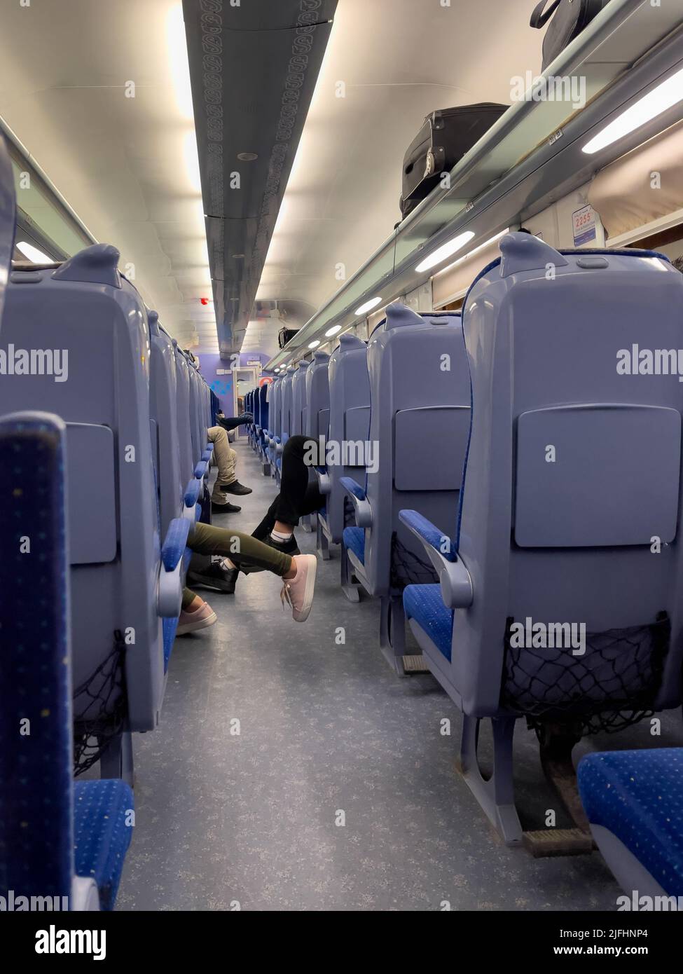 Row of Train seats inside an second class cabin Stock Photo - Alamy