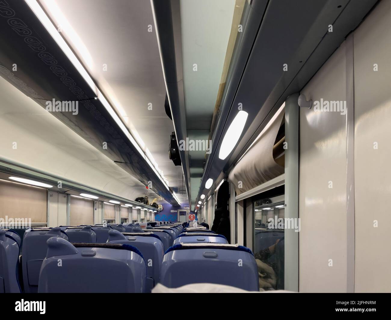 Row of Train seats inside an second class cabin Stock Photo - Alamy