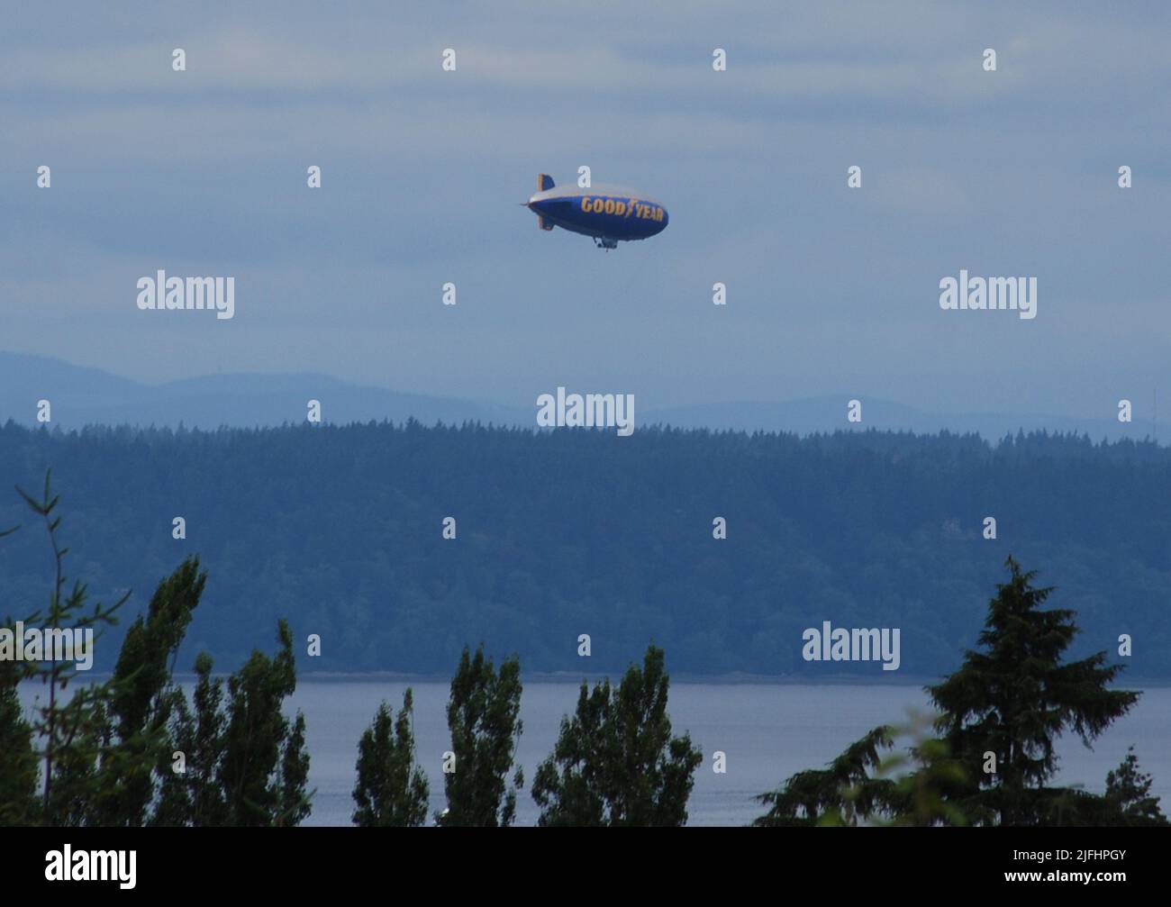 The Goodyear Blimp over Puget Sound Stock Photo - Alamy