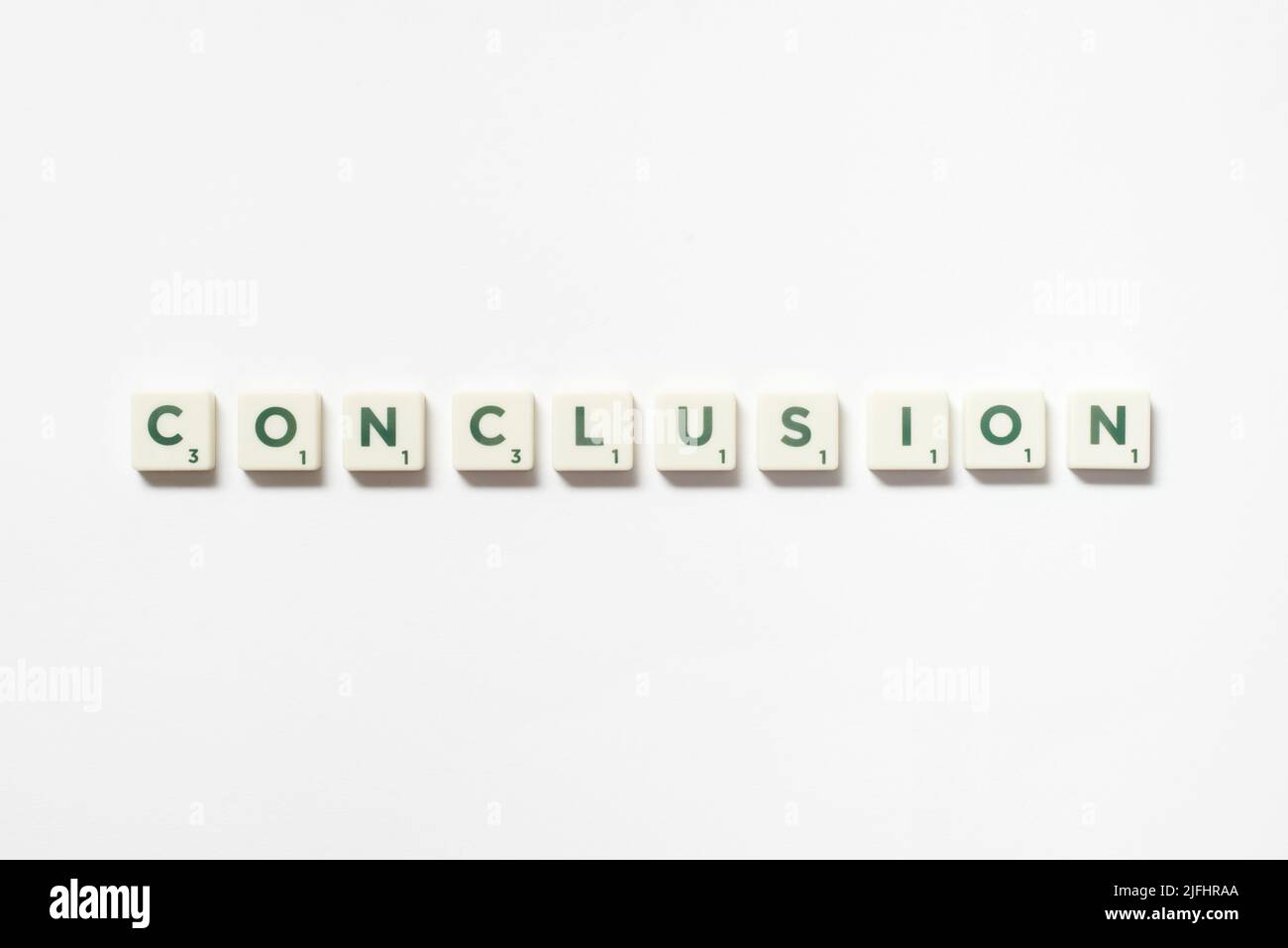 Conclusion formed of scrabble blocks on white background Stock Photo ...