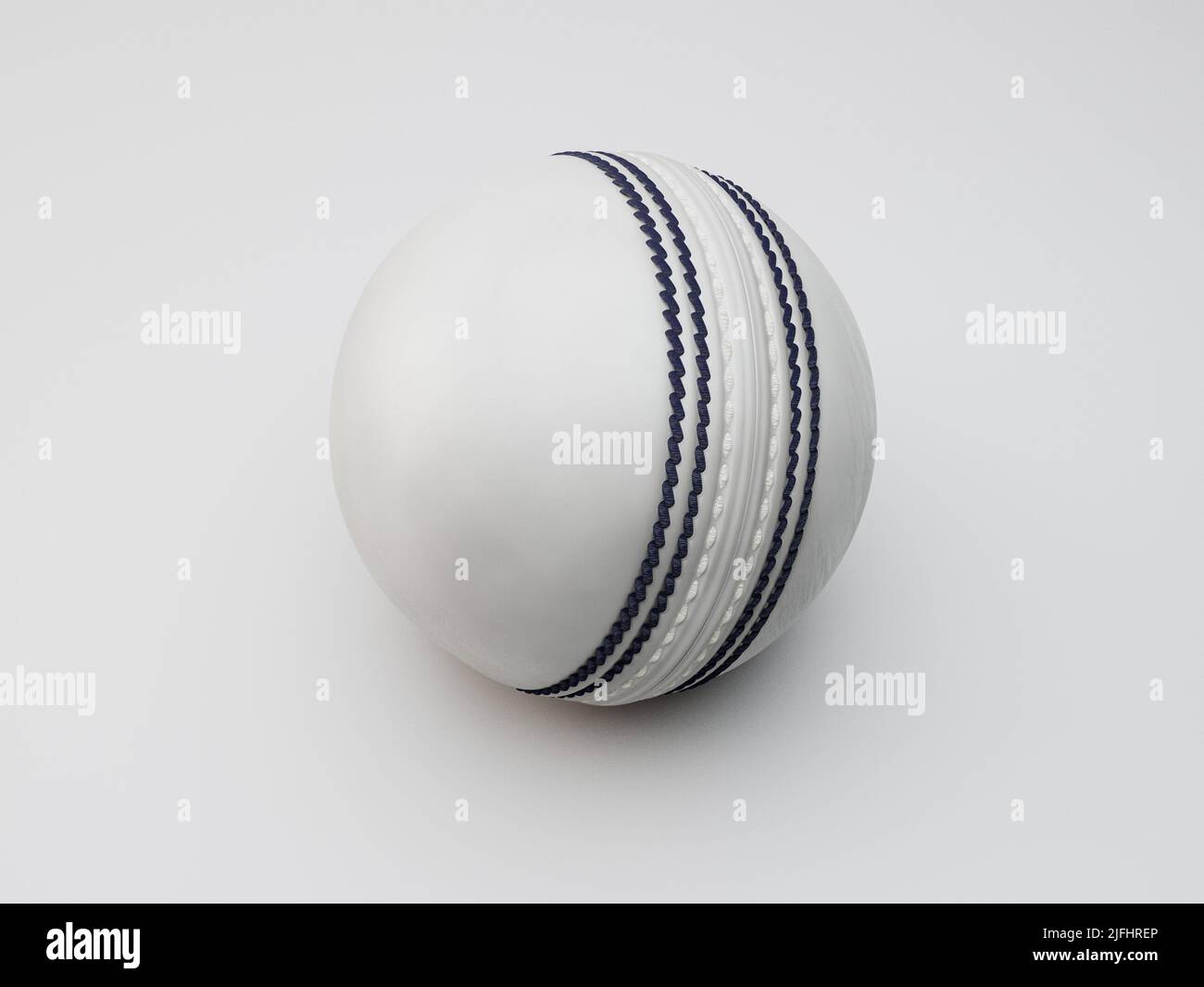 A regular white cricket ball with navy stitching on an isolated ...