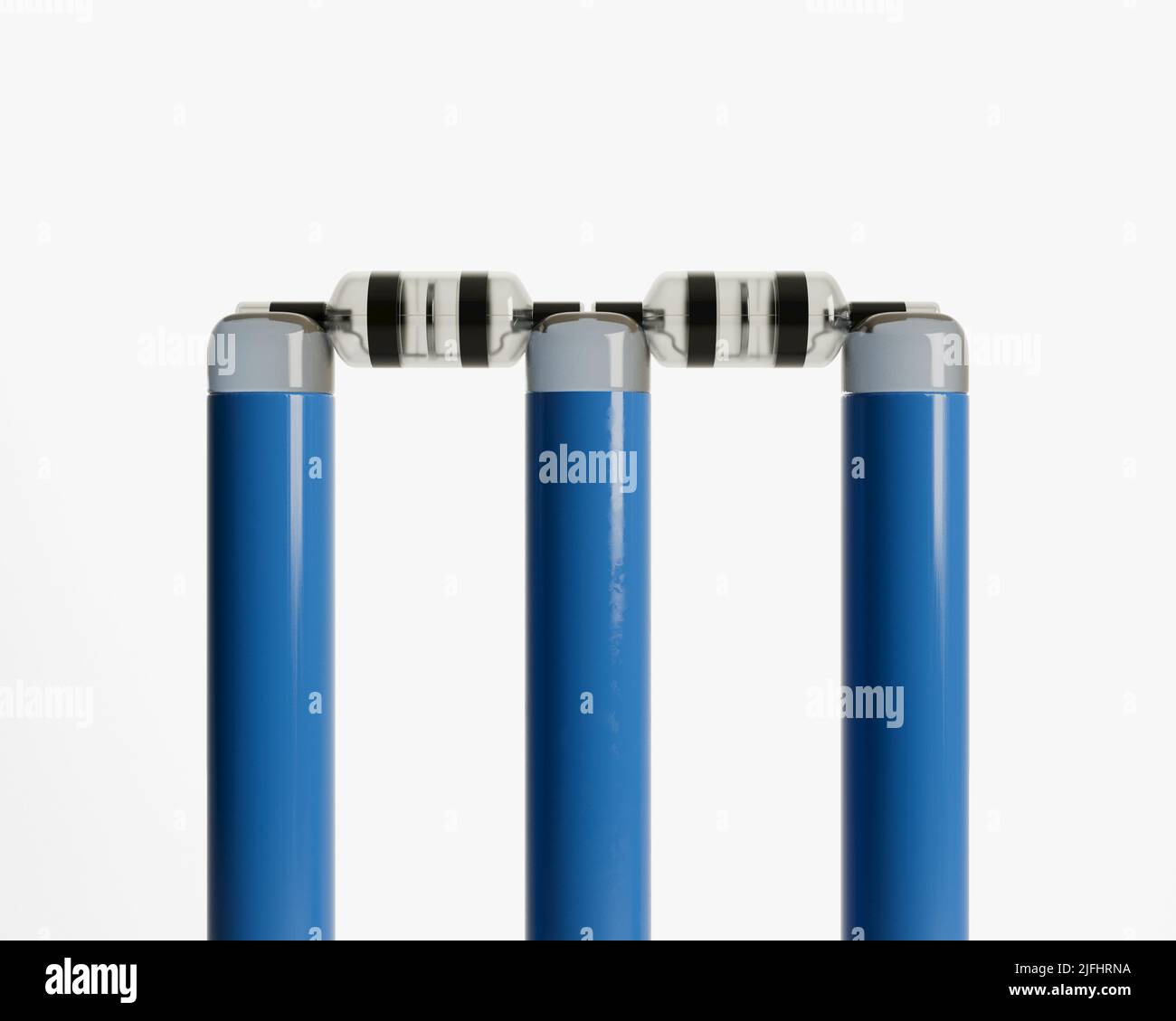 Blue modern electronic cricket wickets with bails on an isolated white ...