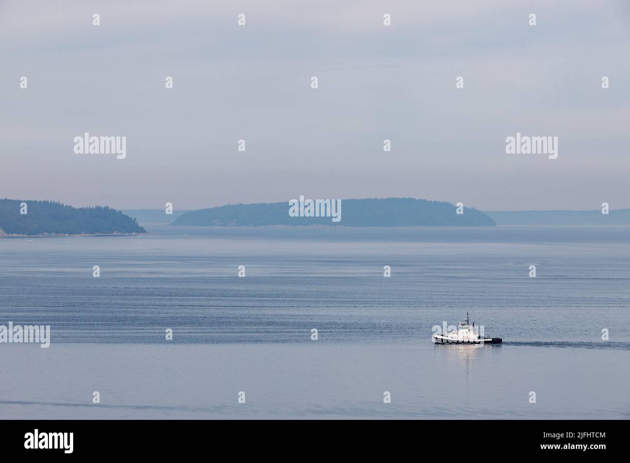 Everett, WA - USA: 02-06-2022: Foss Tugboat Crosses the Puget Sound ...