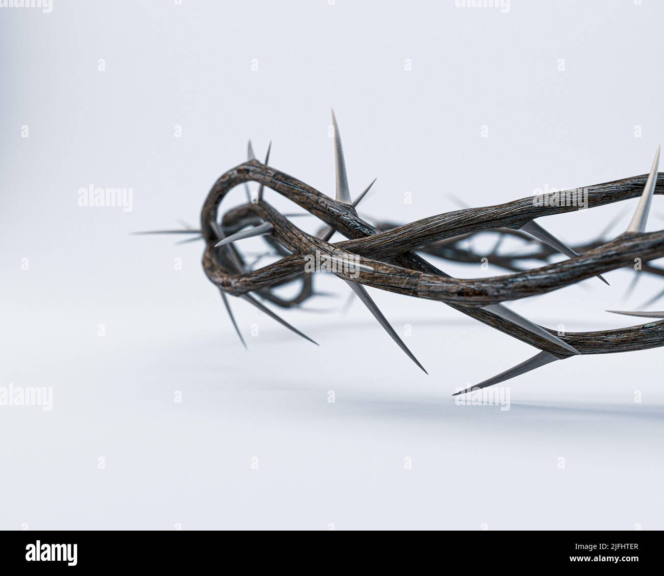 Branches of thorns woven into a crown depicting the crucifixion on an ...