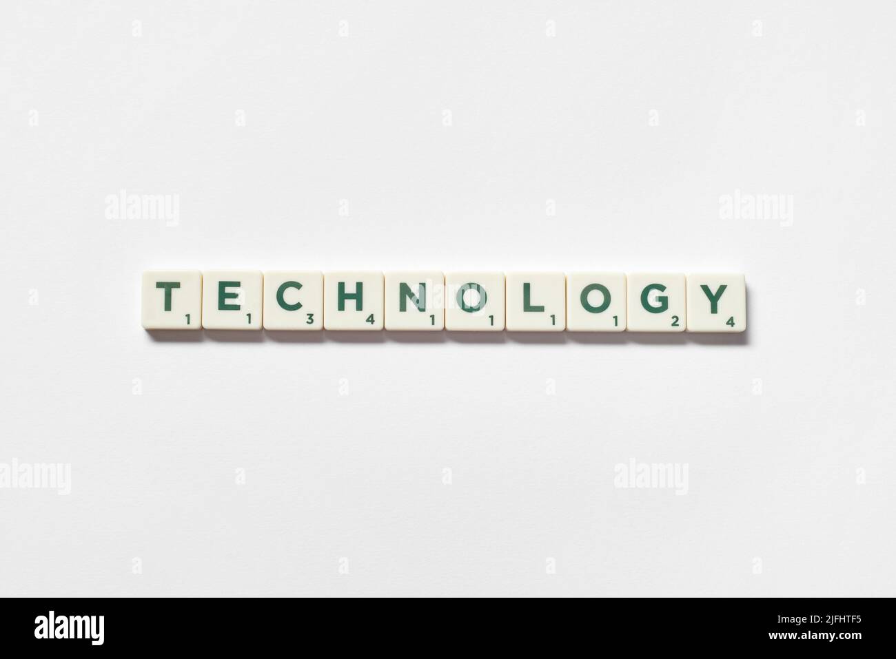 Technology formed of scrabble blocks on white background Stock Photo ...