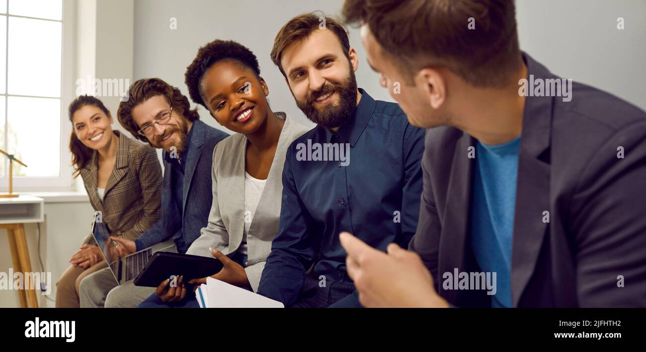 Different candidates sit in line for interview and tell stories sharing ...
