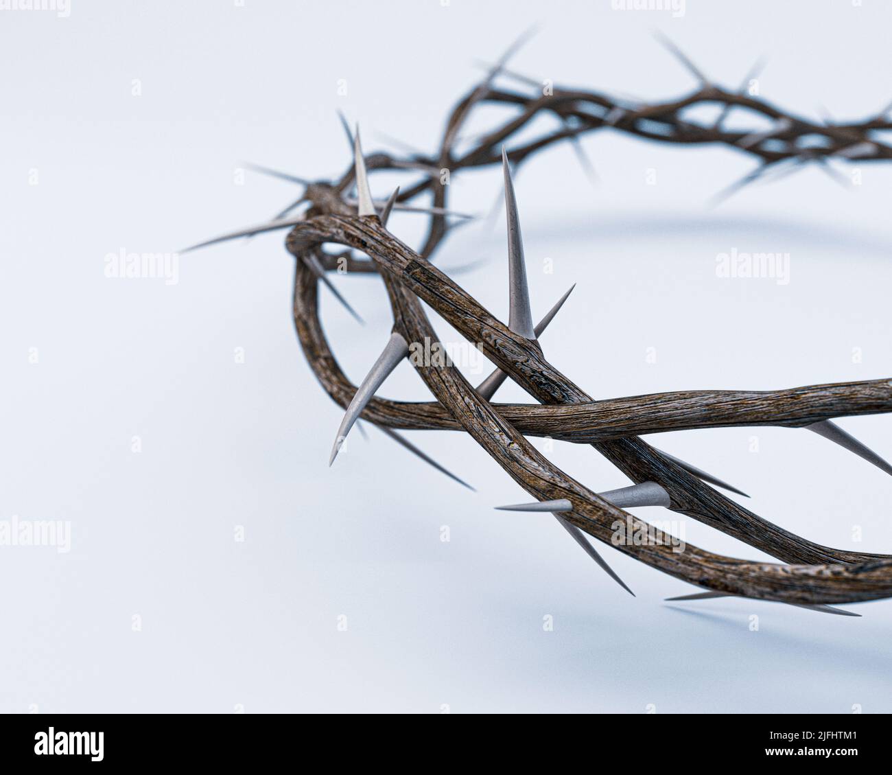 Branches of thorns woven into a crown depicting the crucifixion on an ...