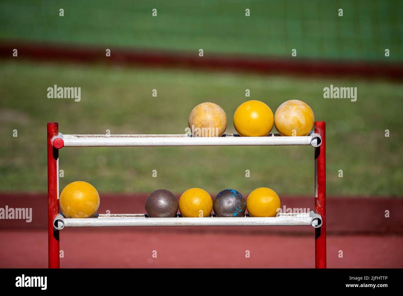 Shot put prepared for competition. Track and field background ...