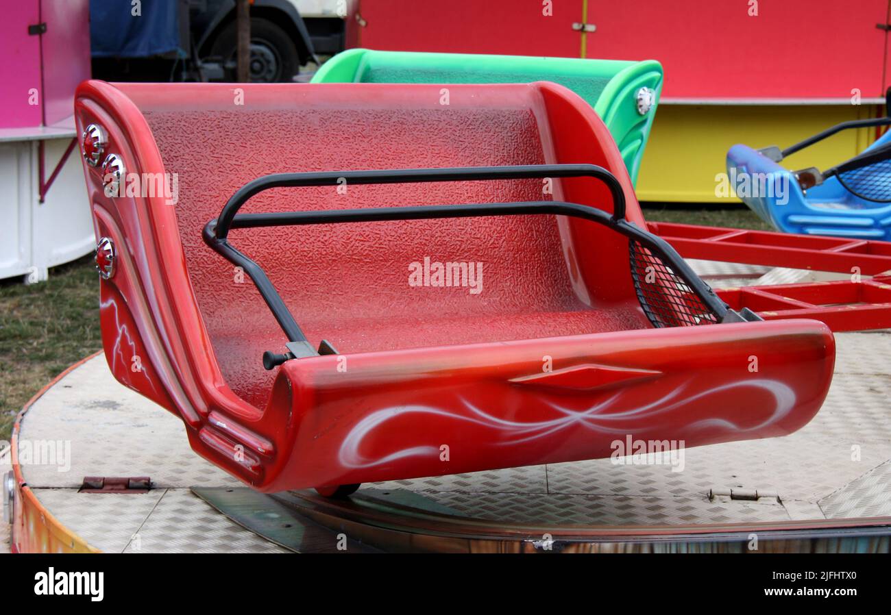 Empty amusement ride seats hi-res stock photography and images - Alamy