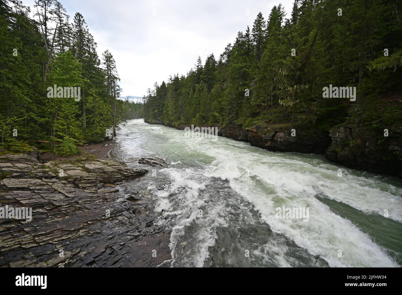 High levels and torrential water flow in McDonald Creek in Glacier ...