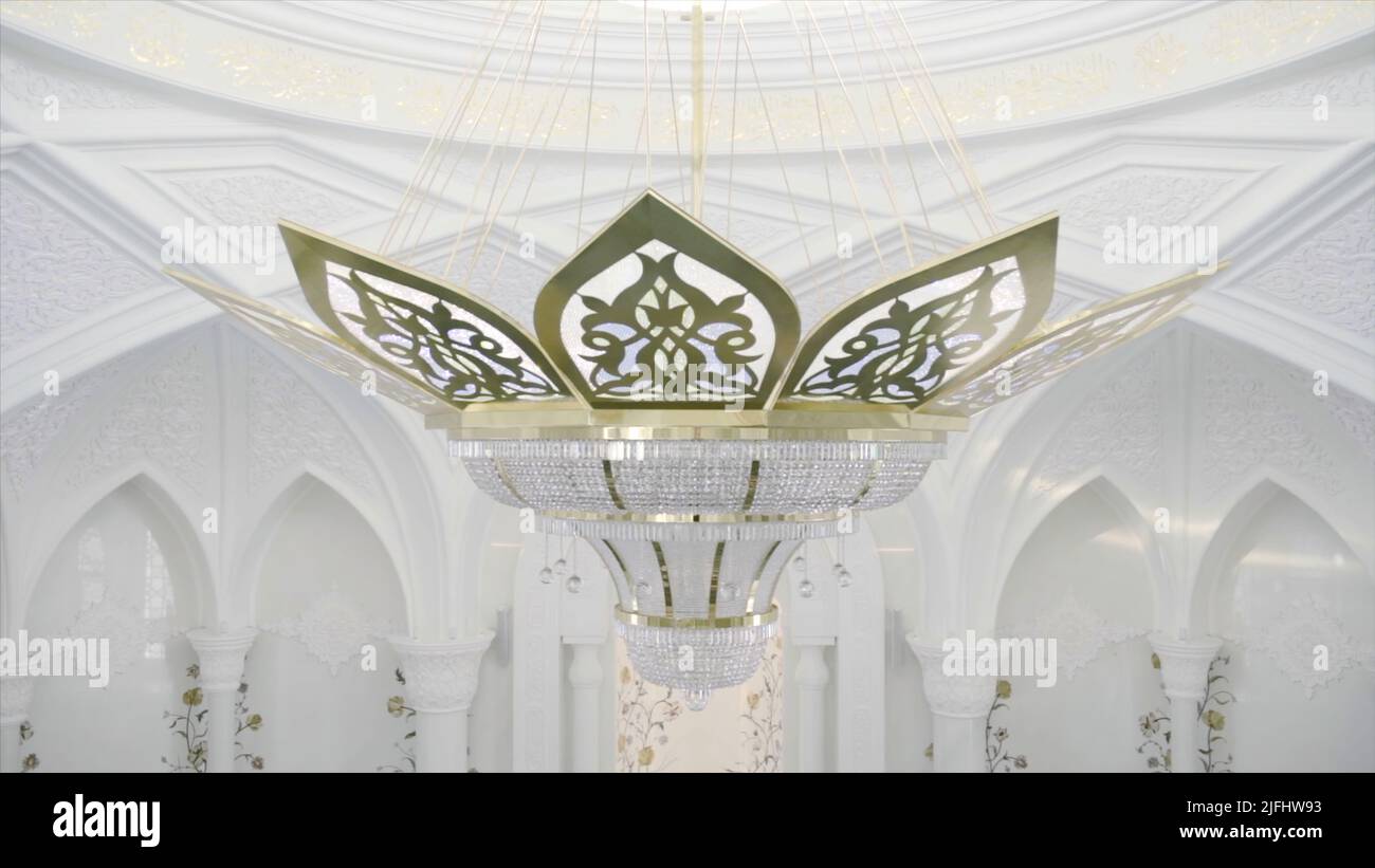 Interior of the mosque with decorative ceiling. Scene. White beautiful ...