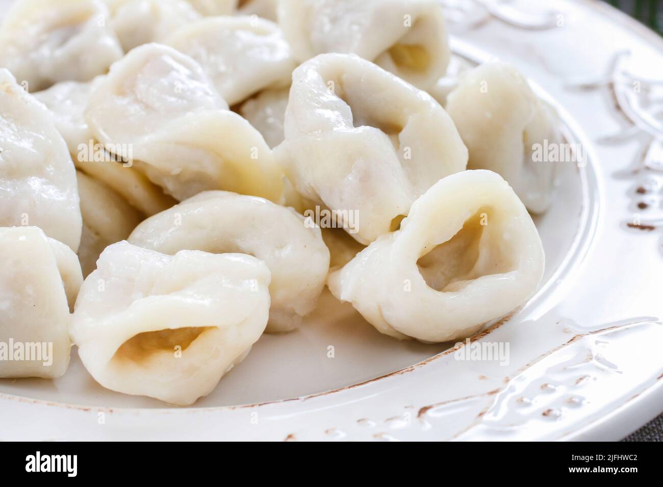 Polish dumplings dish. Traditional pierogi Stock Photo - Alamy