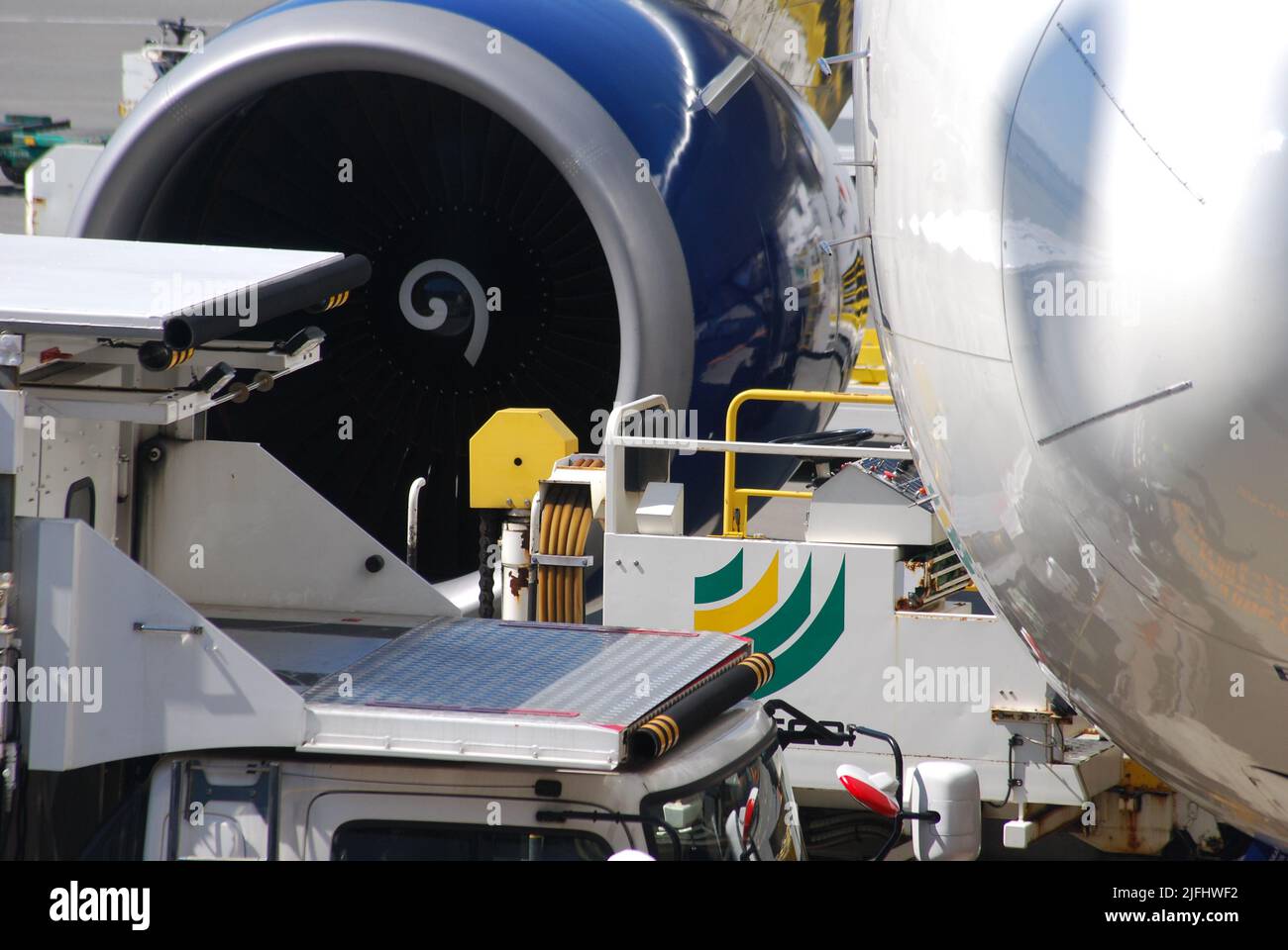 Jet sitting at an airport gate, ready to board Stock Photo - Alamy