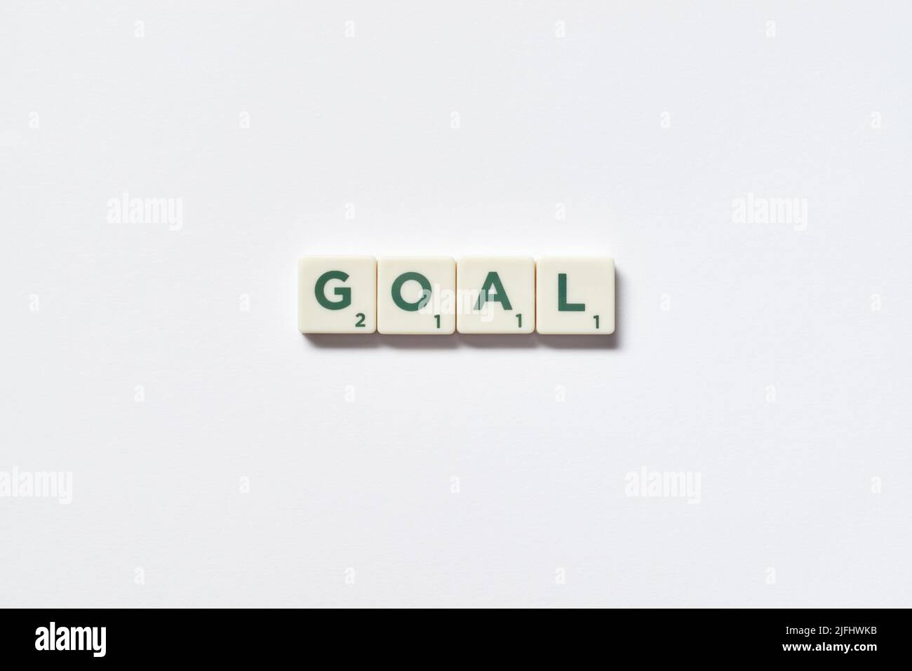Goal formed of scrabble blocks on white background Stock Photo - Alamy