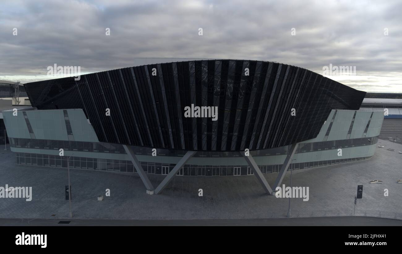 Large black stadium. Stock footage. Large stadium against a gray sky ...