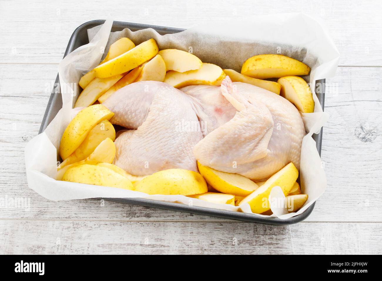 Preparing poultry for baking. Cooking time Stock Photo - Alamy