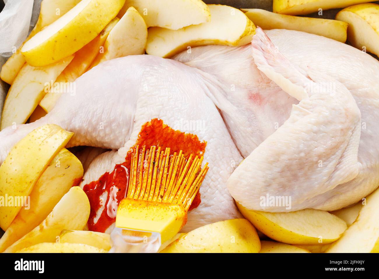 Preparing poultry for baking. Cooking time Stock Photo - Alamy
