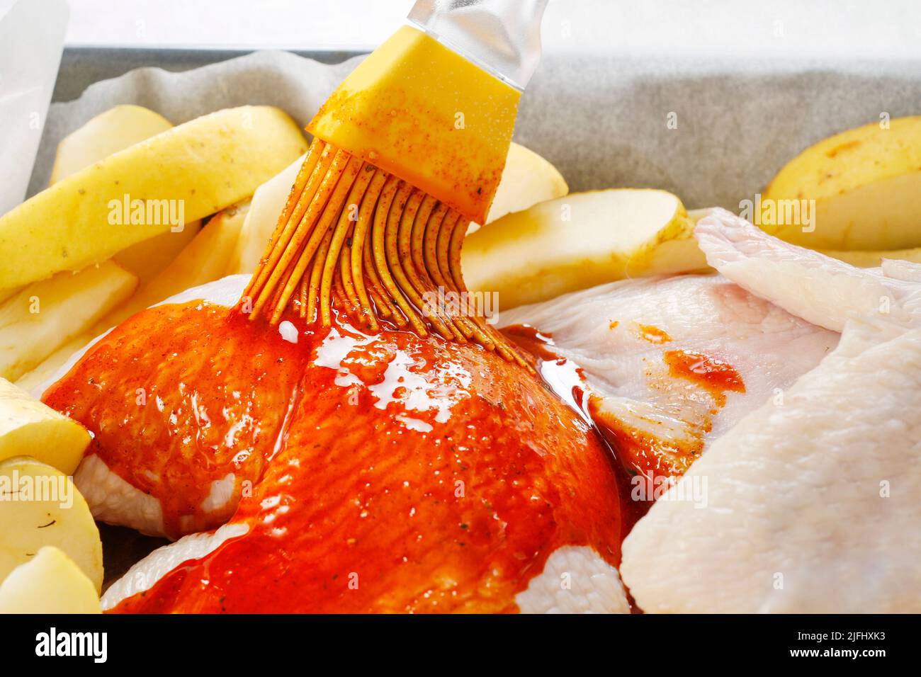 Preparing poultry for baking. Cooking time Stock Photo - Alamy