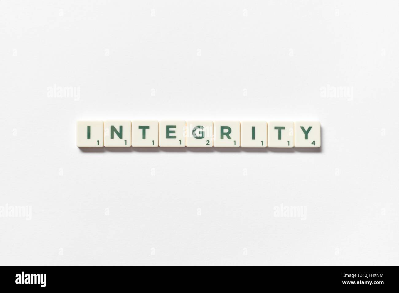 Integrity formed of scrabble tiles on white background Stock Photo - Alamy