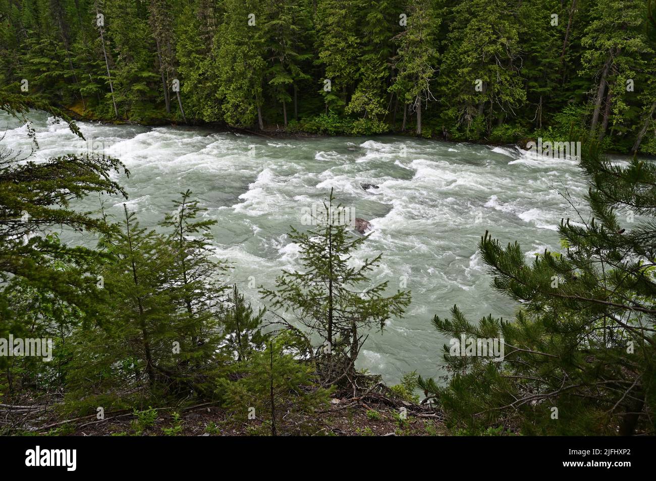 High levels and torrential water flow in McDonald Creek in Glacier ...