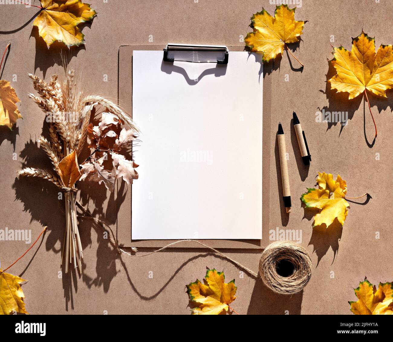 Autumn mockup, white paper on paper pad. Natural Fall leaves, wheat ...