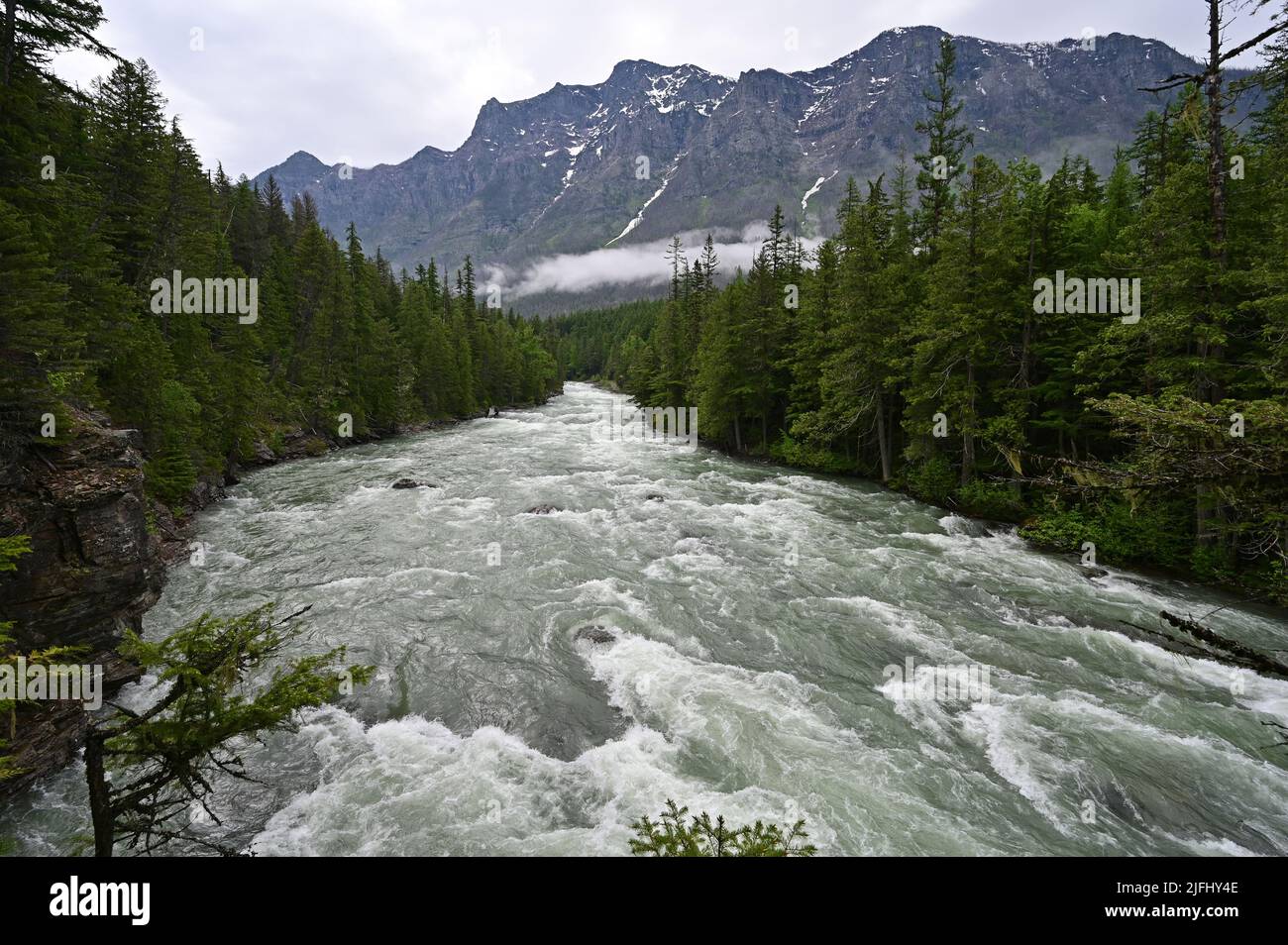 High levels and torrential water flow in McDonald Creek in Glacier ...