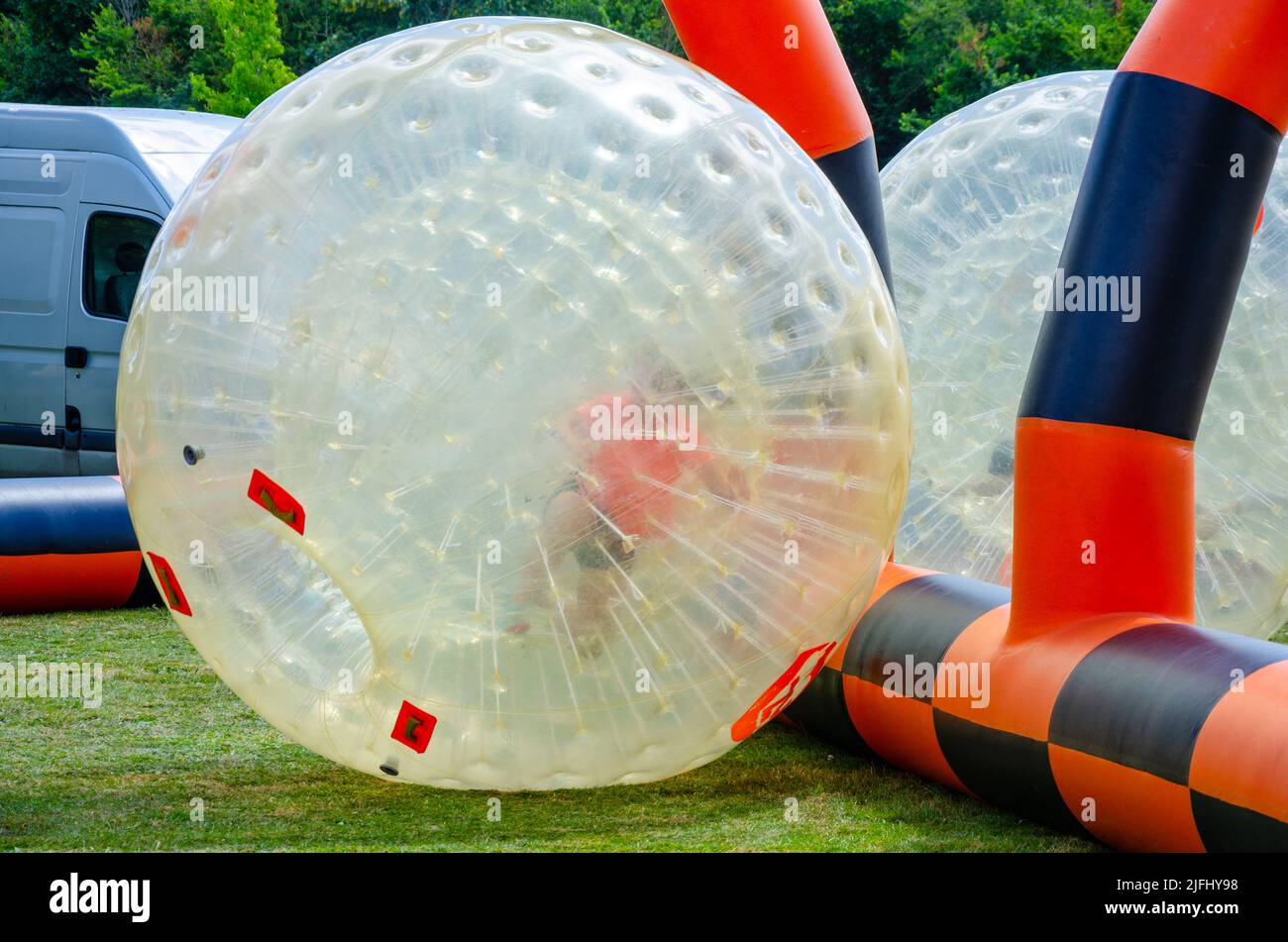 People zorbing in zorb balls in Prospect Park in Reading ,UK Stock ...