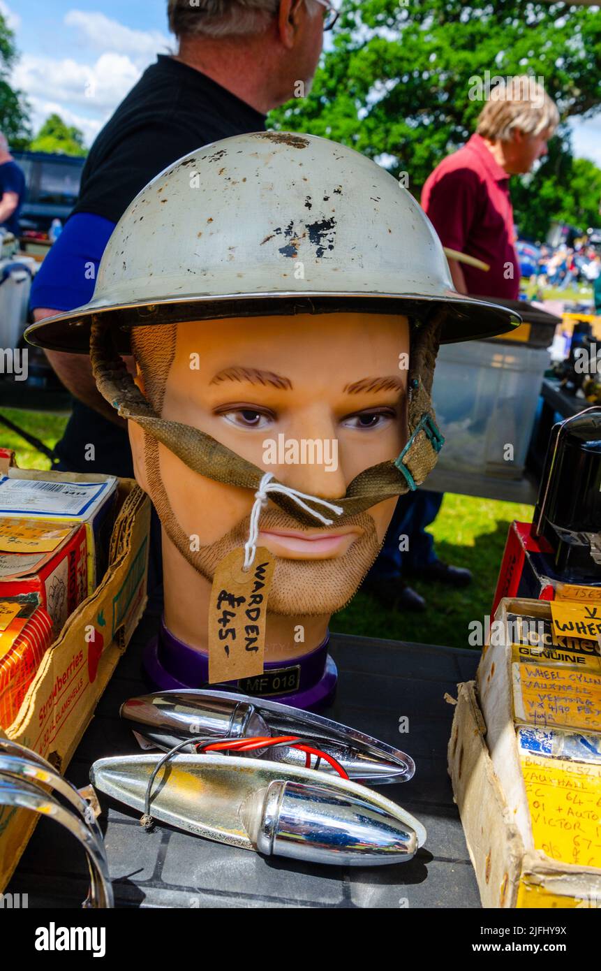 A World War 2 Warden's helmet on display on a mannequin head and on ...