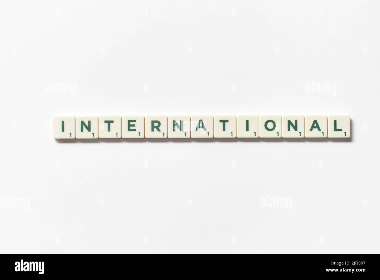 International formed of scrabble blocks on white background Stock Photo ...