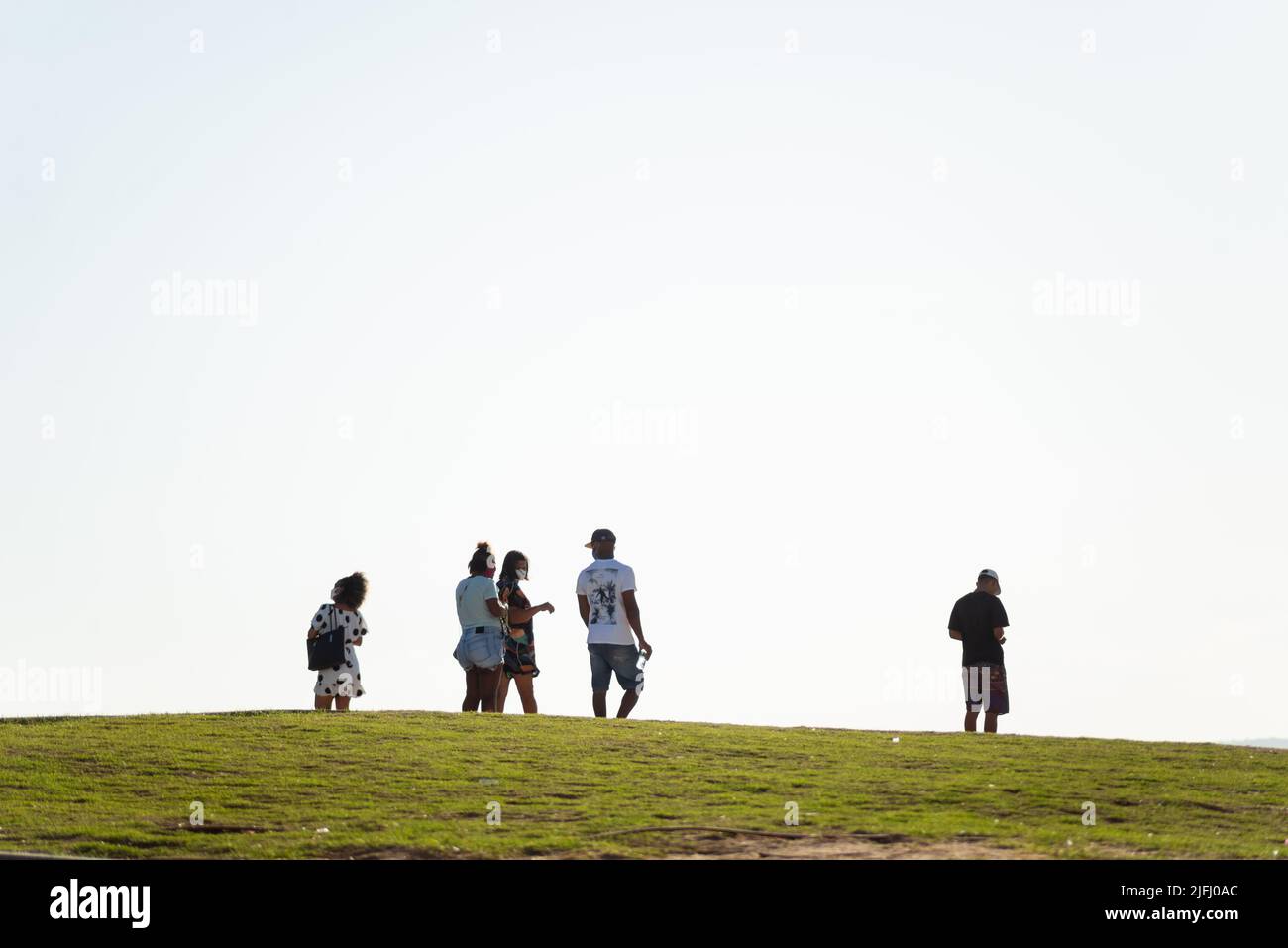 People having fun on a grass floor in Barra neighborhood in Salvador ...