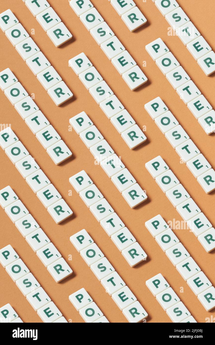 Poster formed of scrabble tiles repeated over brown background Stock ...