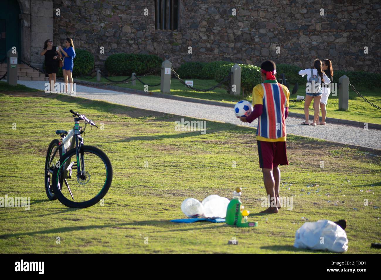 People having fun on a grass floor in Barra neighborhood in Salvador ...