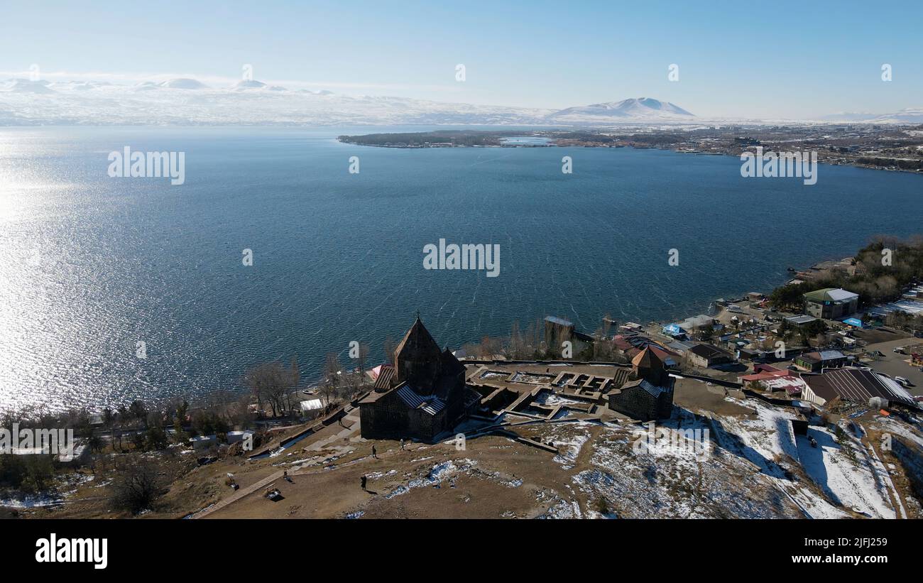 Aerial view of a high hill and a wooden temple on its top. Footage ...