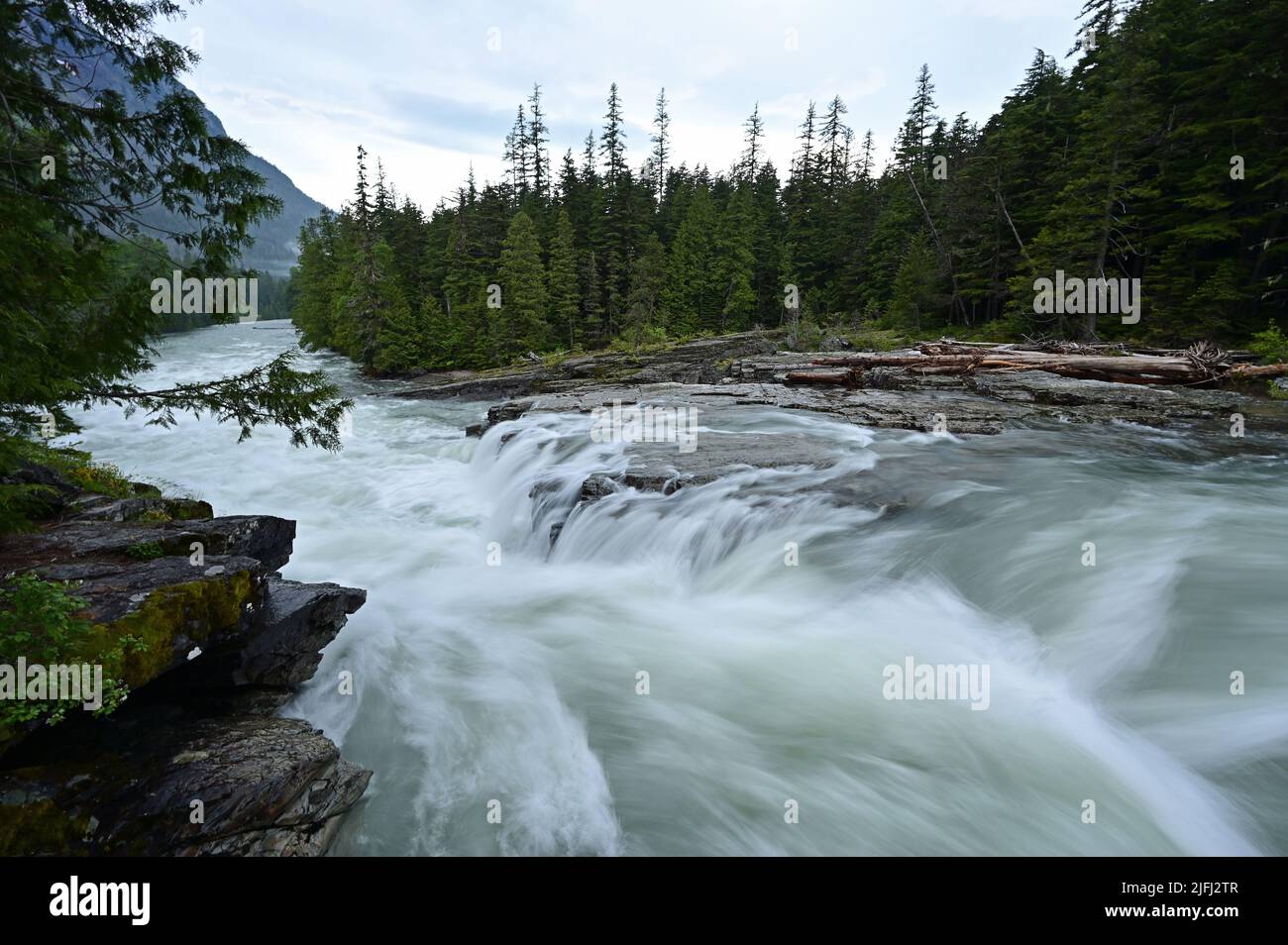 High levels and torrential water flow in McDonald Creek in Glacier ...