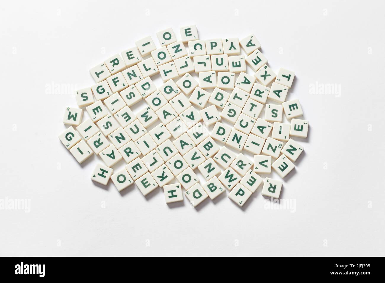 Scrabble tiles bundle on white background Stock Photo - Alamy