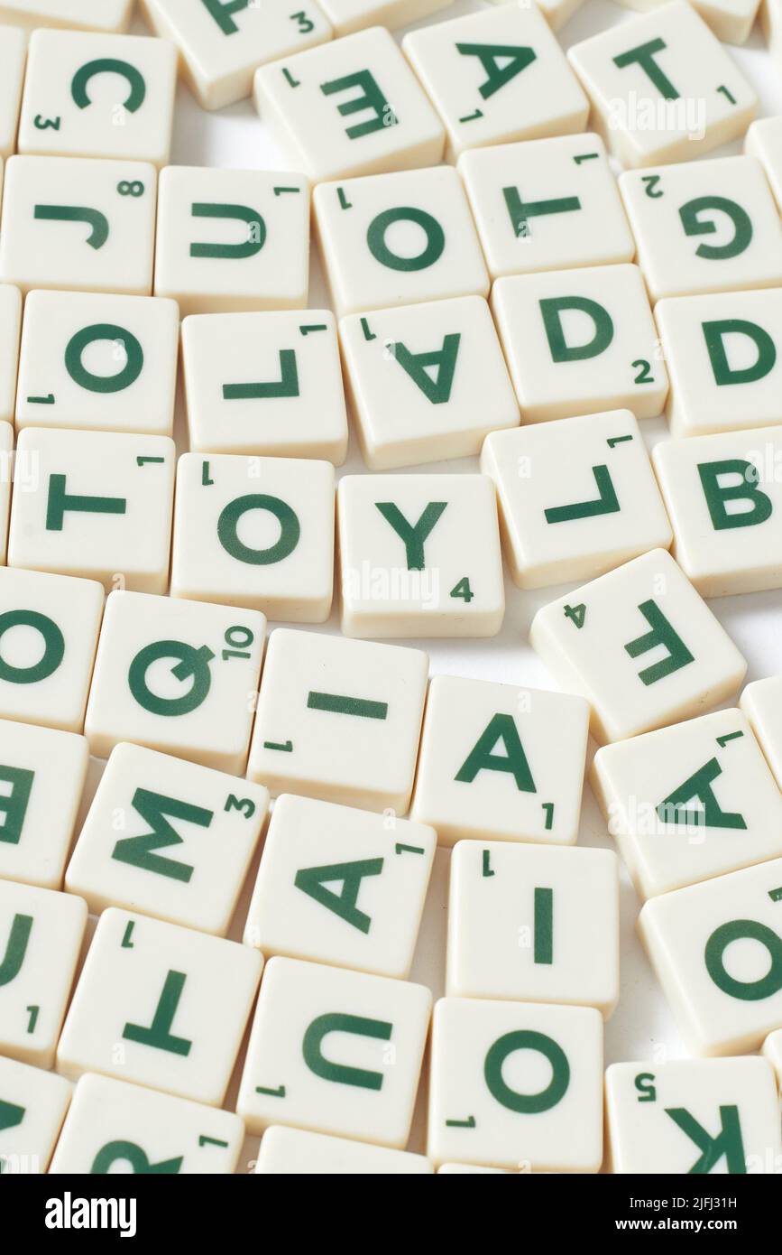 Scrabble letters on white background Stock Photo - Alamy