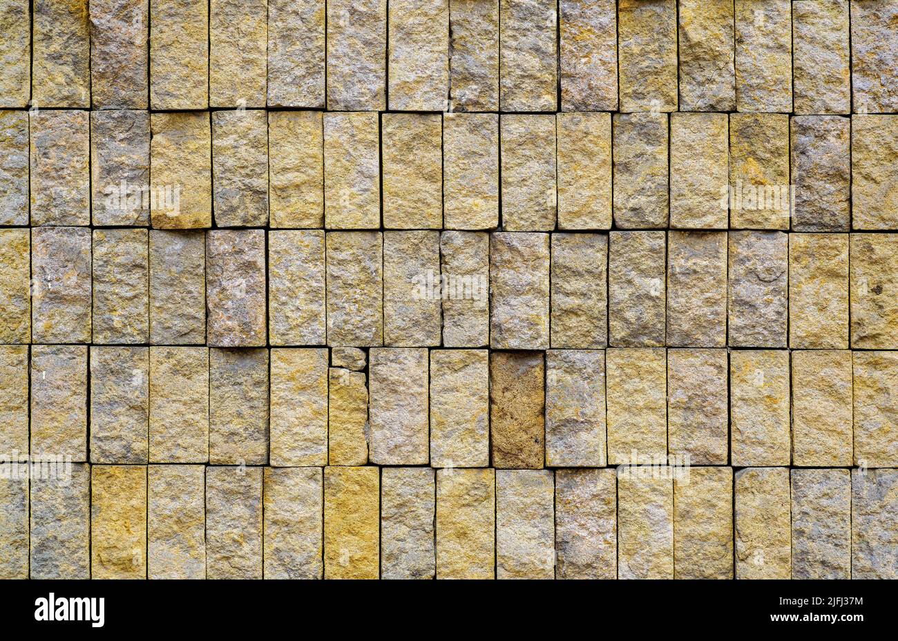 The area with small stone segments of rectangular shape, Texture, or ...