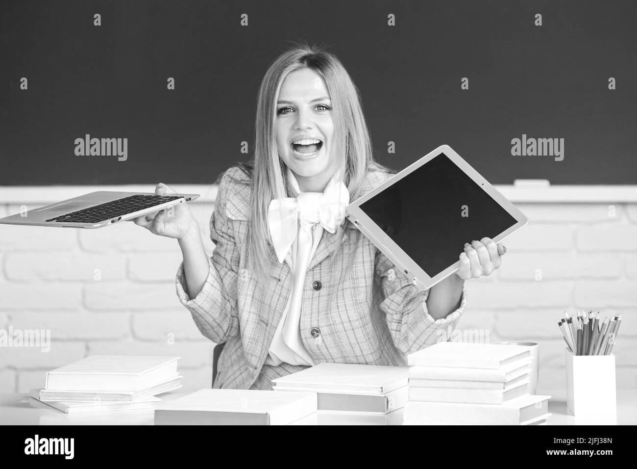 Portrait of a young, confident and attractive female student with ...